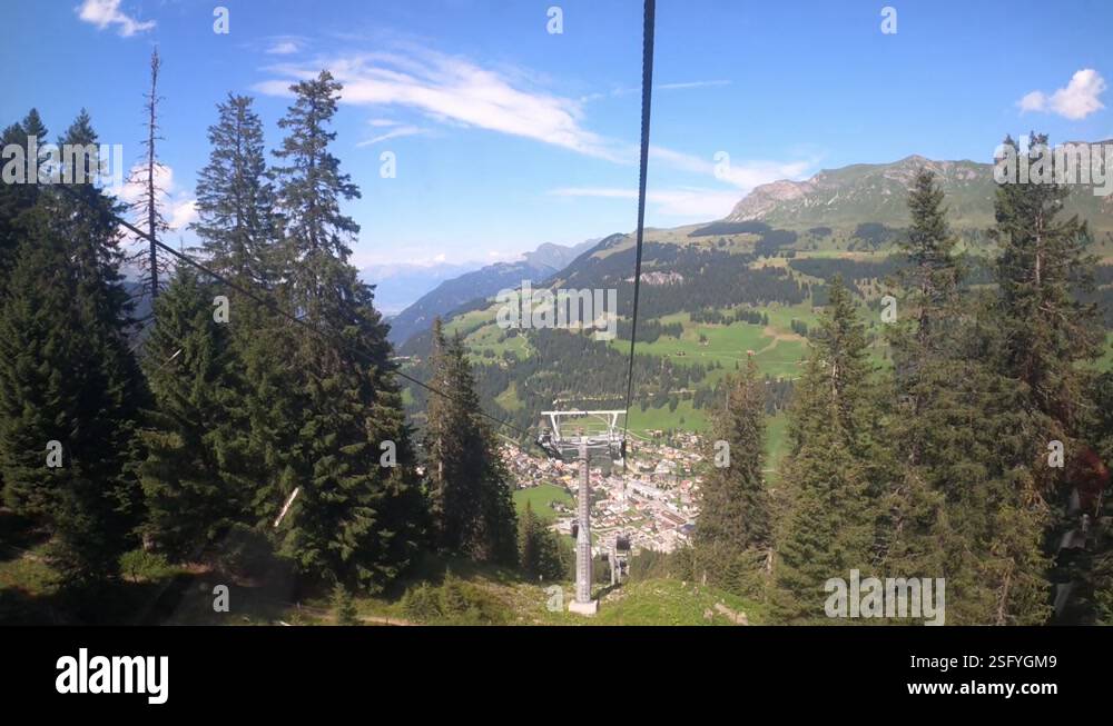 Cable car ride in canton Grisons Churwalden. View from a cable car on ...