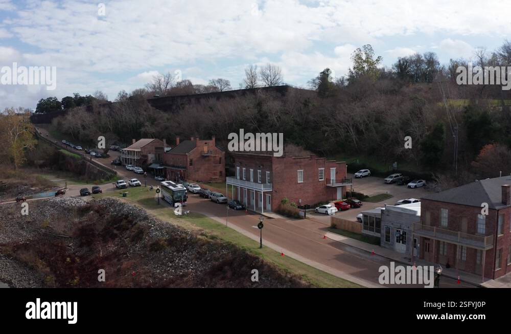 Close-up aerial shot dollying along Natchez Under-The-Hill in Natchez ...