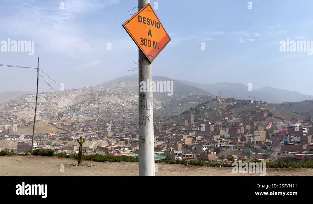 Poor slum city over mountain range at Manchay, Lima, Peru. Shot from a ...