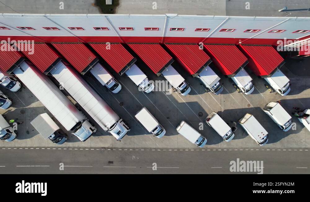 Logistics center and vehicles waiting to be loaded or unloaded Stock ...