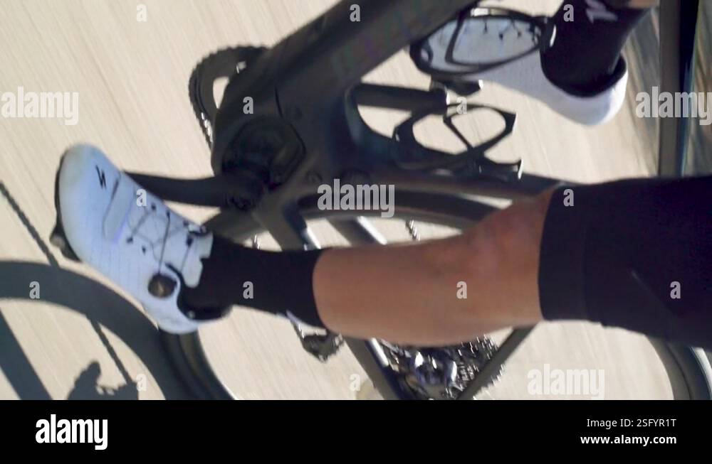 High speed cyclist detail with his bike. vertical capture Stock Video ...