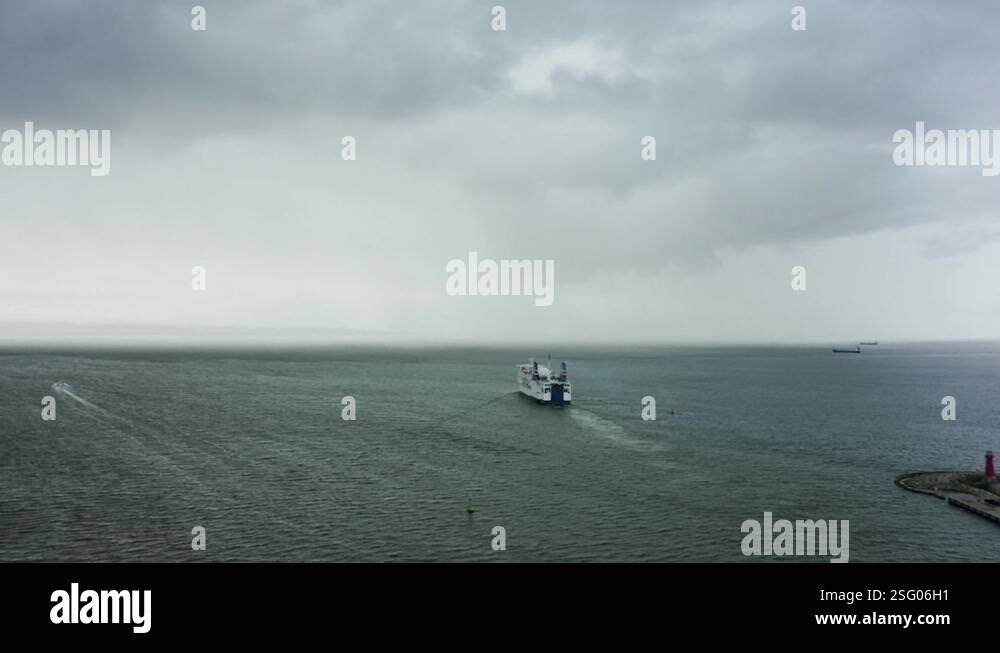 Drone shot at a car ferry port in heavy rain and storm Stock Video ...