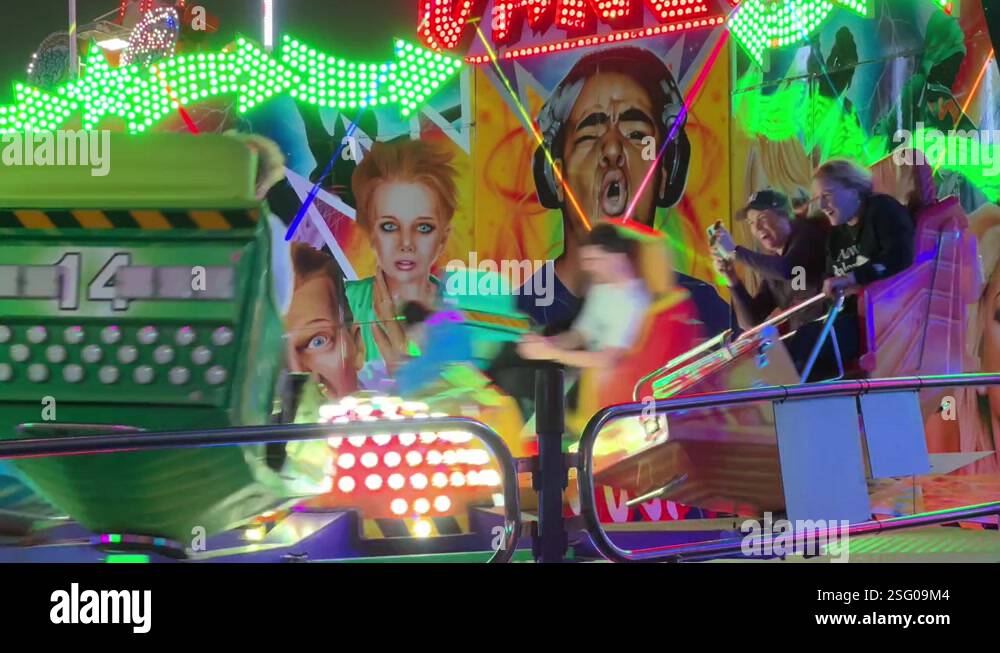 80s retro neon ride, spinning in high speed at Ekka Royal Brisbane Show ...