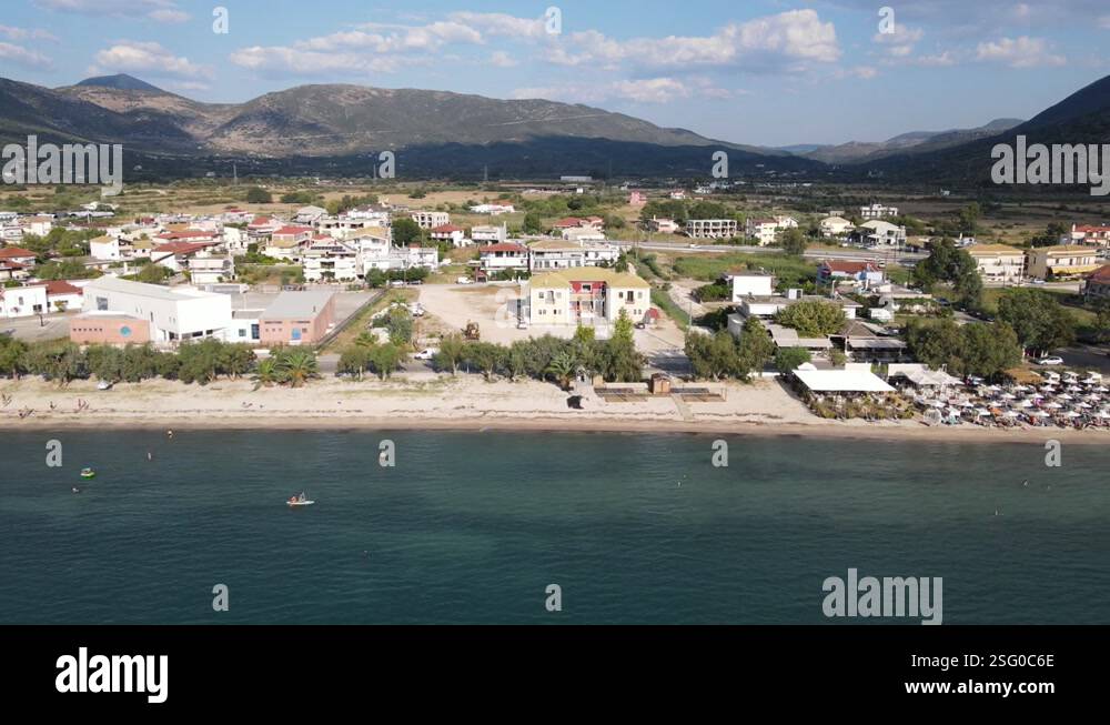 Aerial View Of Plataria Beach Crowded Of Tourists Near Sivota In Greece ...