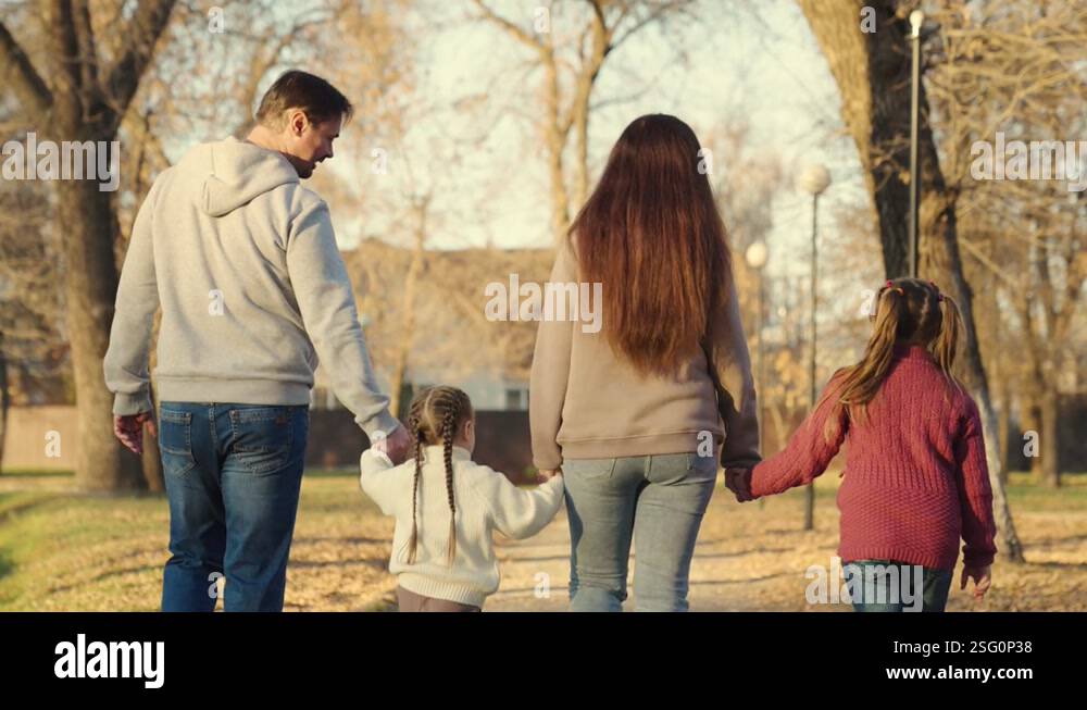 Big happy family, parents, children girl walk in park in autumn. Dad ...