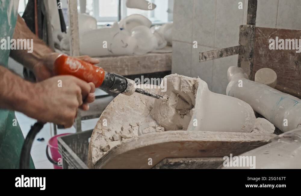 Man Removing Plaster Cast From Socket Stock Video Footage - Alamy
