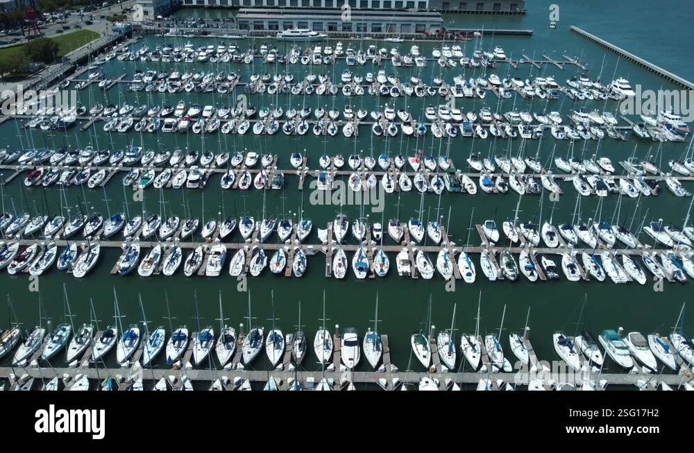 Tilt Shot Revealing Huge Number Of Fishing Boats Side By Side Anchored ...