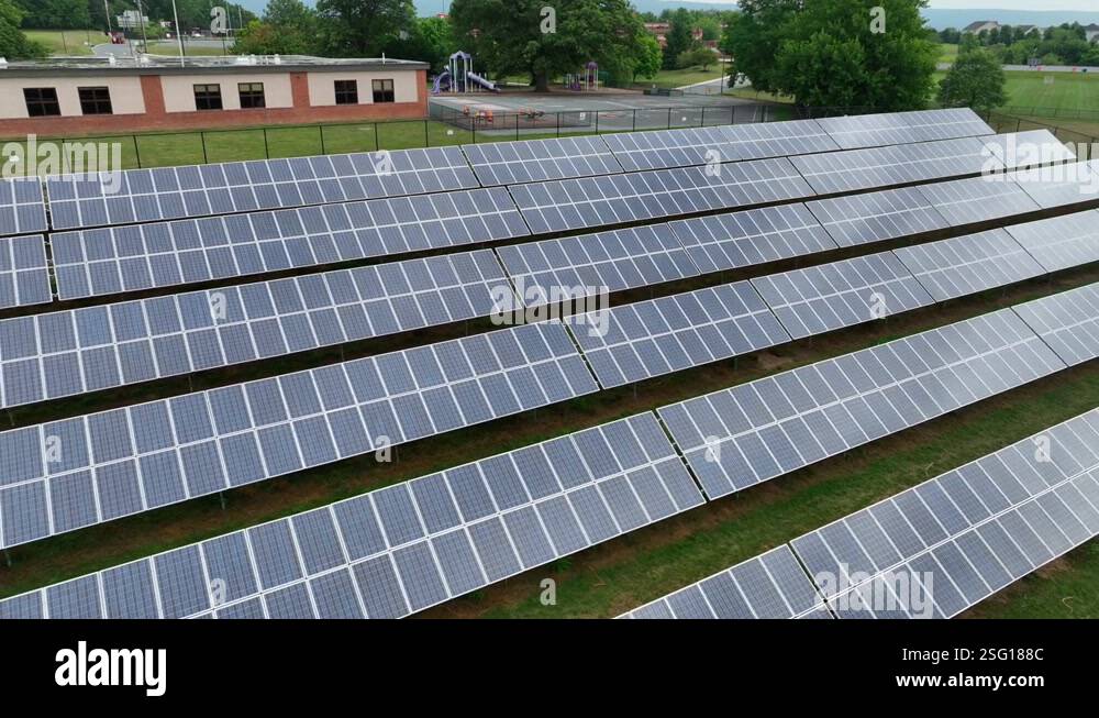 Solar panel arrays at American school. Renewable green clean energy theme Stock Video Footage ...
