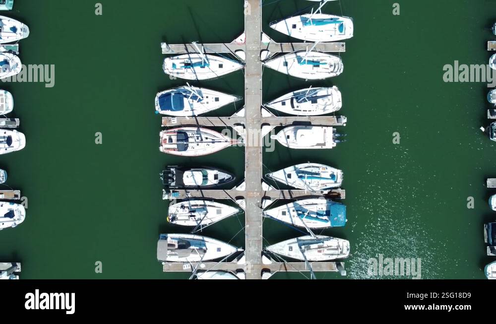 Rising Overhead Shot Of Fishing Boats Side By Side parked At Marina ...