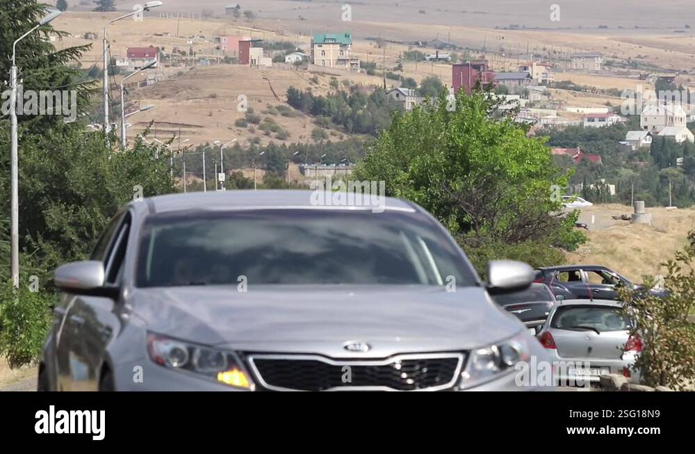 A view of vehicles moving with fast speed in Tbilisi Highway in Georgia Stock Video Footage - Alamy