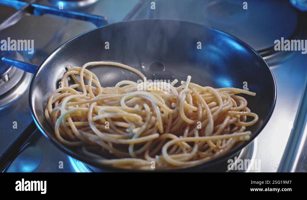 Plating Cooked Spaghetti Pasta With Greek Yogurt Sauce. close up Stock ...