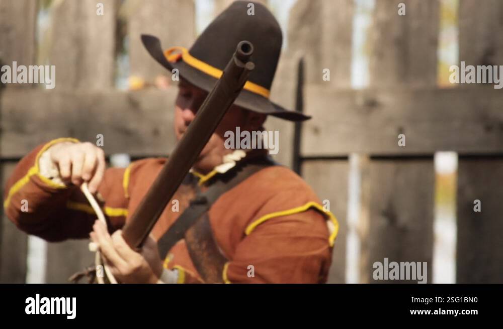 17th century Colonial American Militia Soldier FIRES his Matchlock ...