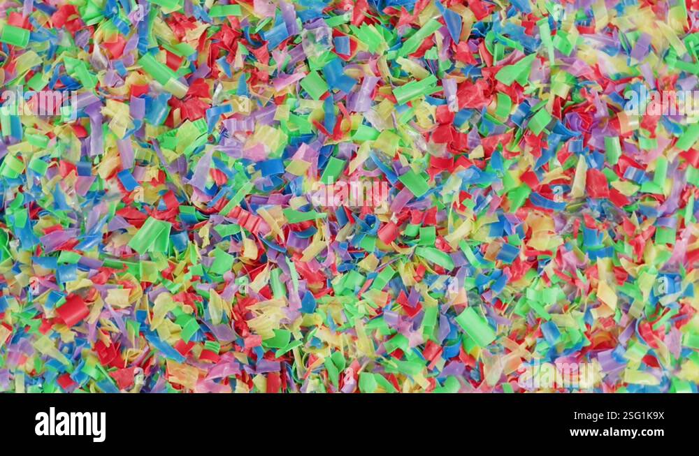 Microplastic pollution, plastic particles top view rotating, garbage ...