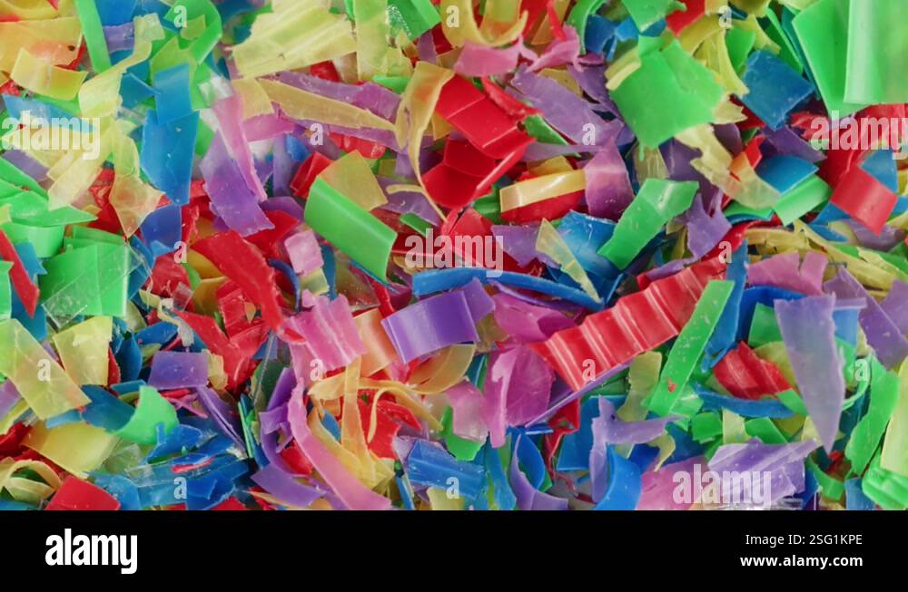 Microplastic pollution, plastic particles top view rotating, garbage ...