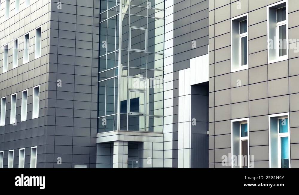 Modern factory office building, covered with metal building cladding ...