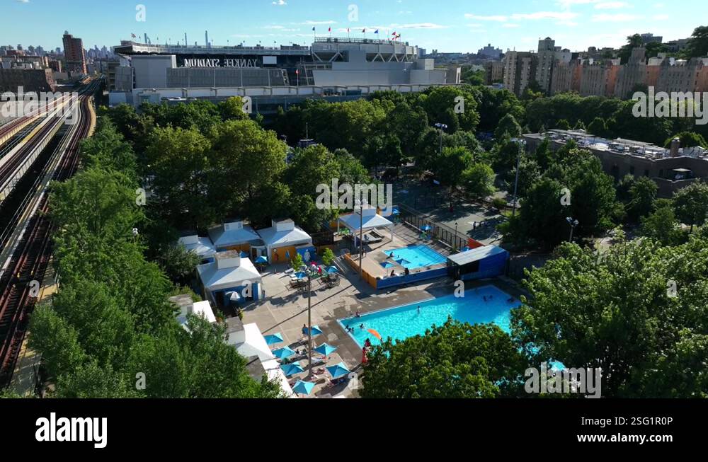 Outdoor pool at community park in New York City. Harlem neighborhood in ...