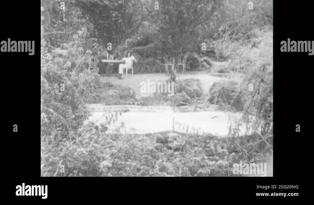 1970s: Man diving into swimming pool. Portraits of men. Men in formal ...