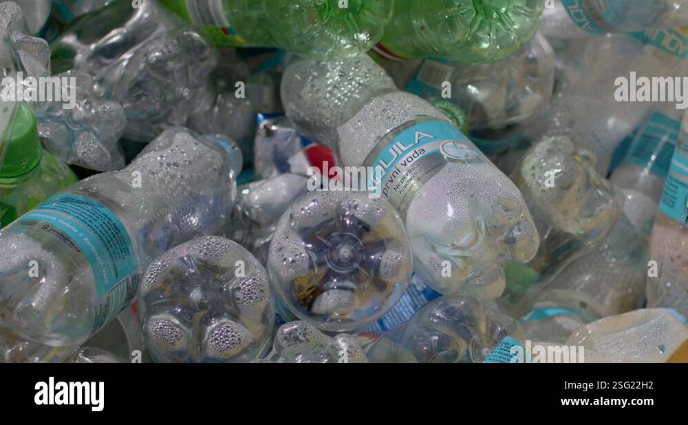 Sorting garbage at mobile waste sorting point. Plastic recycling in ...