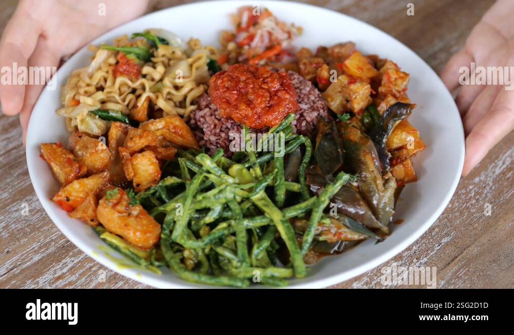 Tasty and nutritious dish on a wooden table, a dish with a large ...