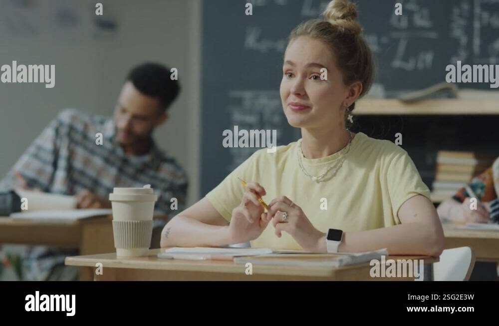 Female College Student Asking Question during Class Stock Video Footage ...