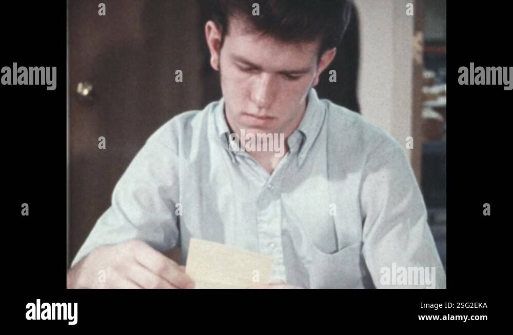 1970s: Man takes paper out of pocket. Man fills out "APPLICATION FOR ...