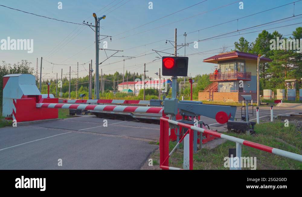 4k Closed railway crossing waiting for a passing train, Saint ...