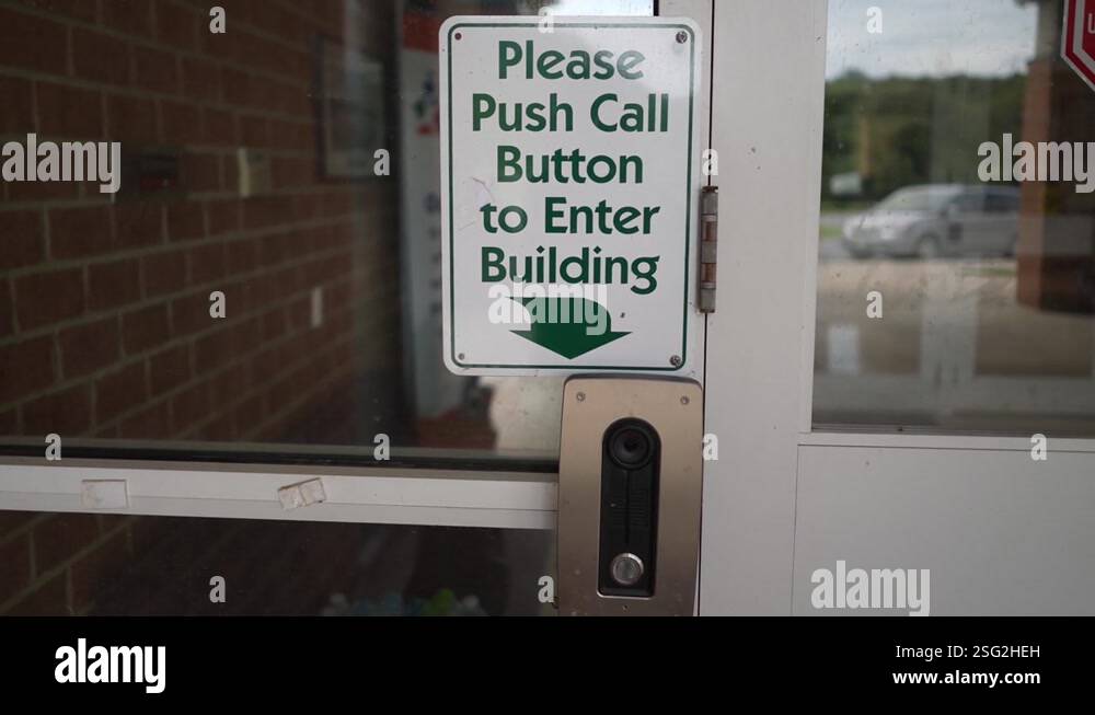 Sign posted at entrance to for their security and safety at school ...