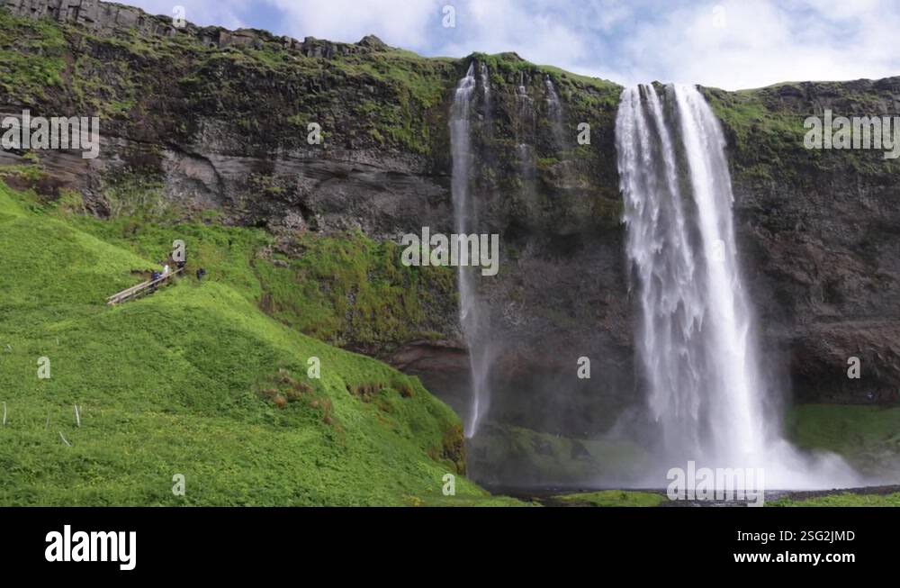 Seljalandsfoss Falls in Iceland with close up panning left to right ...