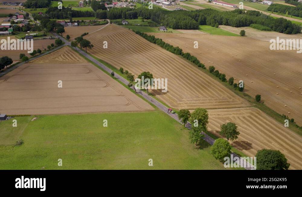 Traveling Vehicles On Local Roads Between Wheat Fields On A Countryside ...