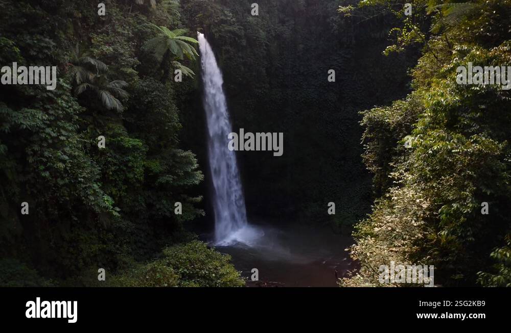 Beautiful high Nung Nung waterfall at the Indonesian island Nali hidden ...