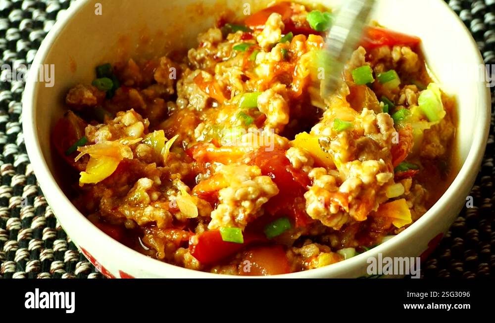 Close up Nam Prik Ong (Spicy Northern Thai Pork and Tomato) in bowl ...