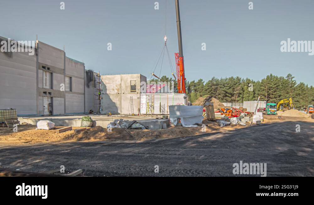 Shadows move as the sun crosses the sky over a construction site ...