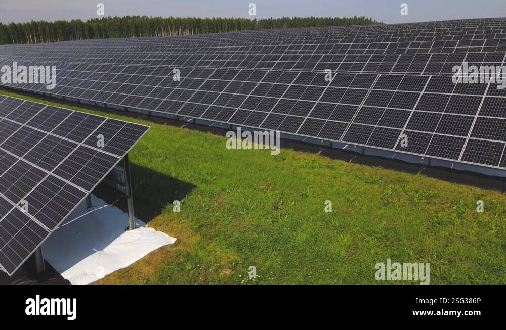 Solar panels in the meadow. Alternative energy from the sun ...