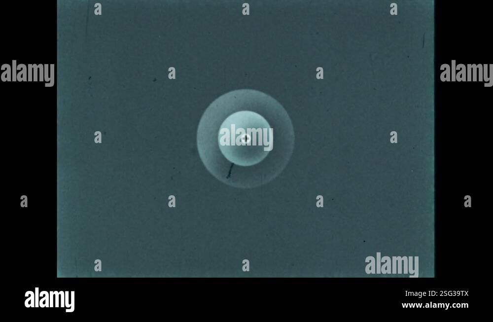 1960s: Drawing of atom with layers. Periodic table of elements with ...