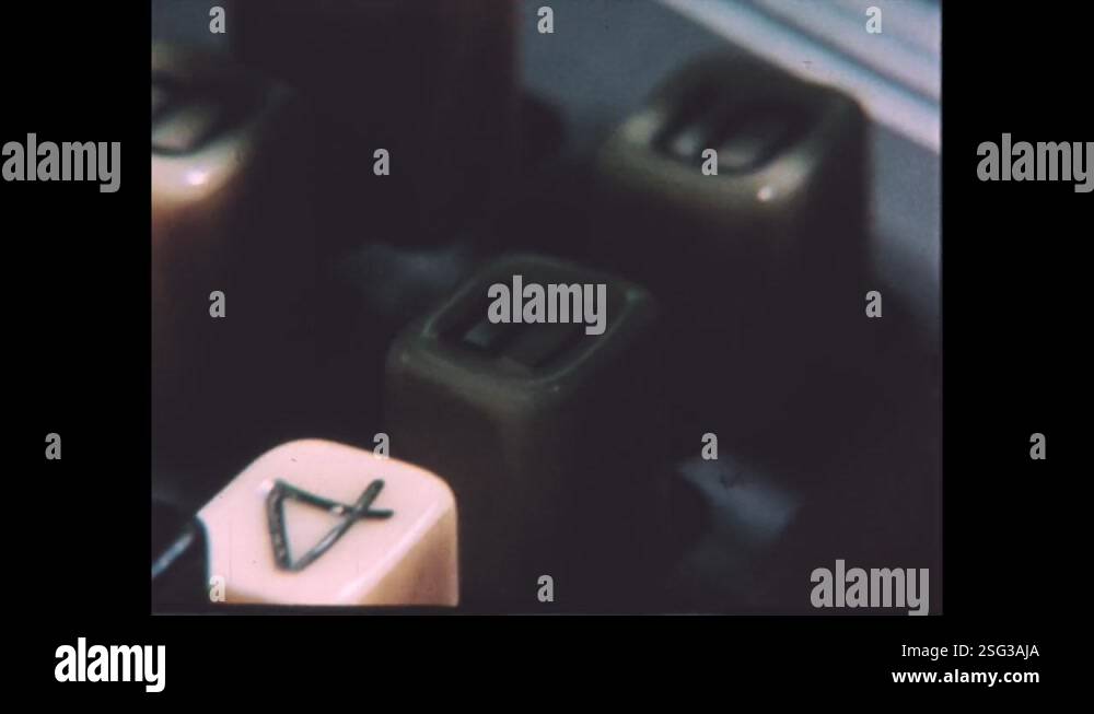 1970s: fingers type keys. Digits on calculator. Victor copier. Man ...