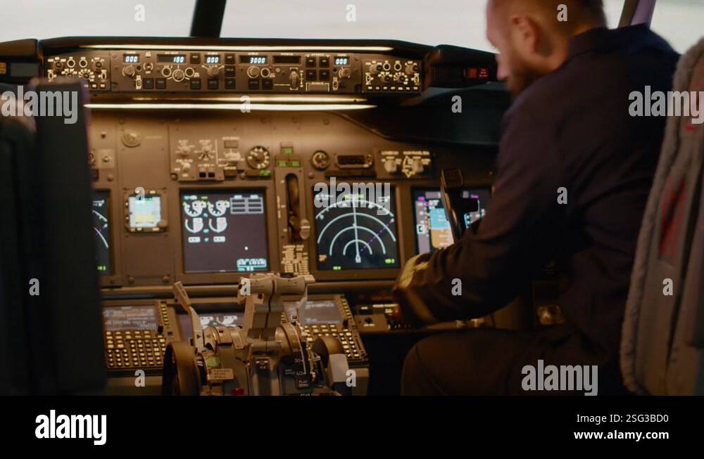 Aviation captain putting coordinates to fly airplane to destination ...
