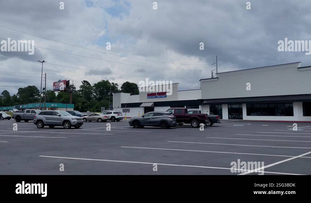 Exterior pan Harbor Freight retail store and empty retail strip mall ...