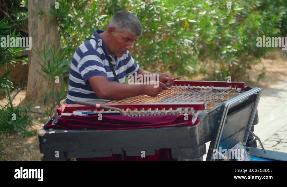 Busker playing musical instrument Stock Videos & Footage - HD and 4K ...