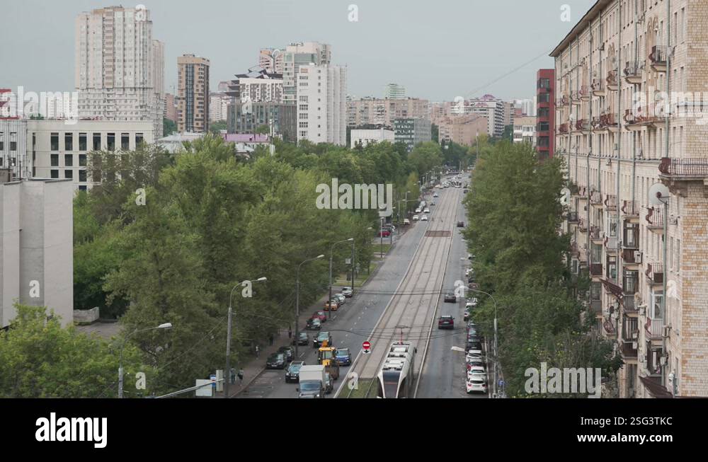 View from the window to the busy street of one of the districts of ...
