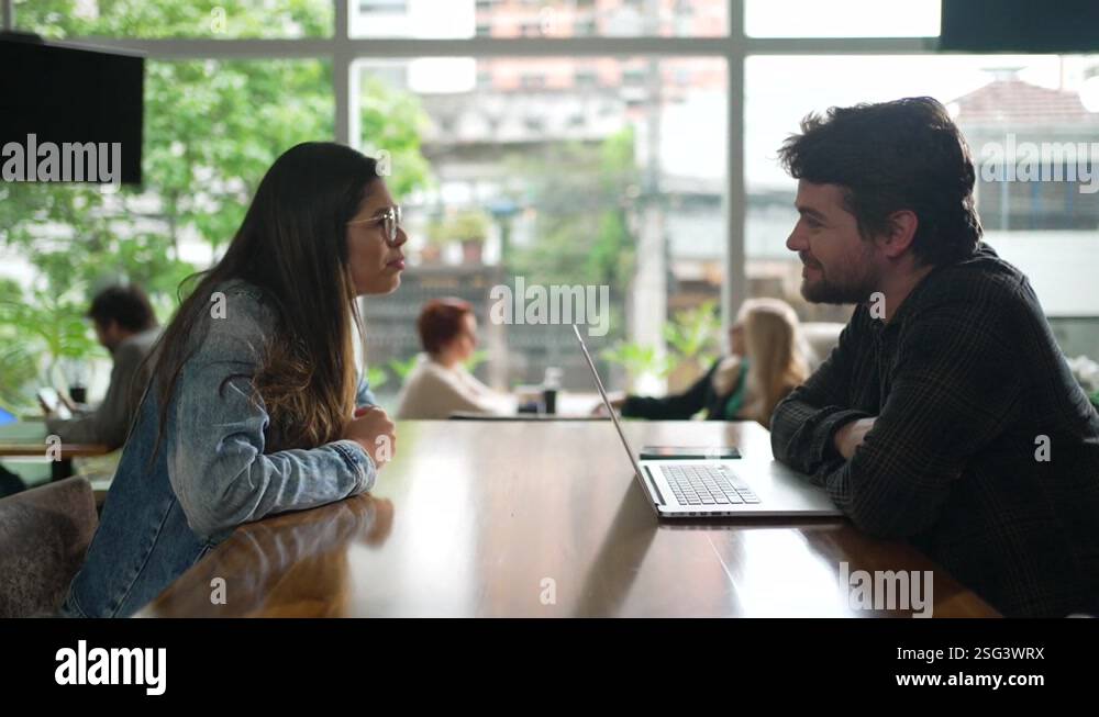 People at coffee shop talking. Couple chatting at cafe restaurant. Man ...