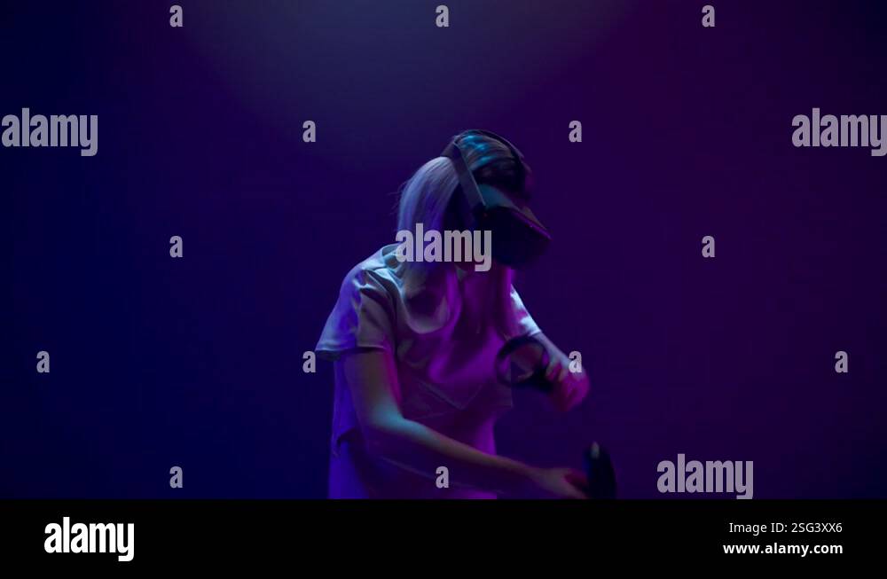 Spellbound girl using vr glasses closeup. Woman watching movie playing ...