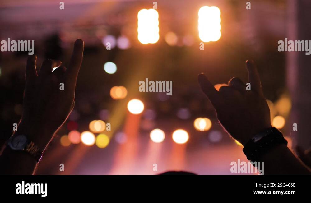 Man partying at rock concert in front of stage - close up Stock Video ...