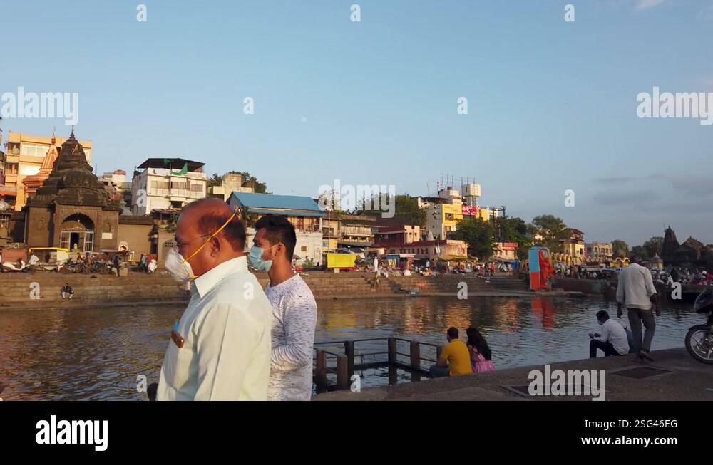 Daytime Scene In Ramkund Neighborhood In Nashik, India With Devotees ...