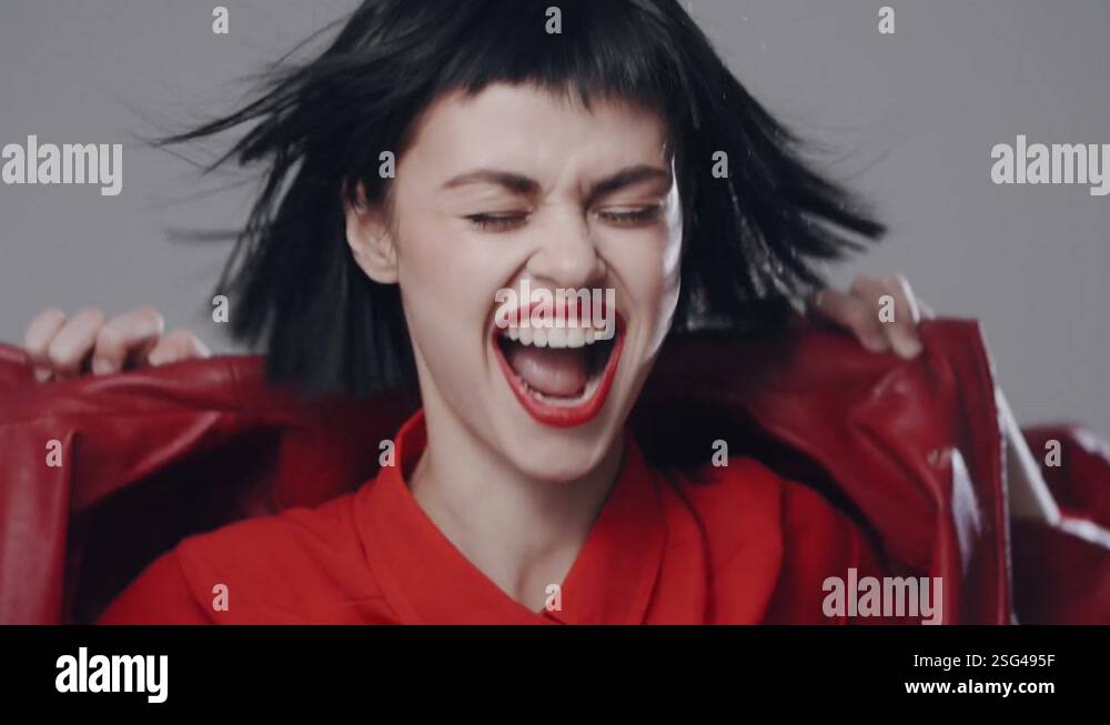 Beauty portrait of a fashion model with beautiful make-up with red lips ...