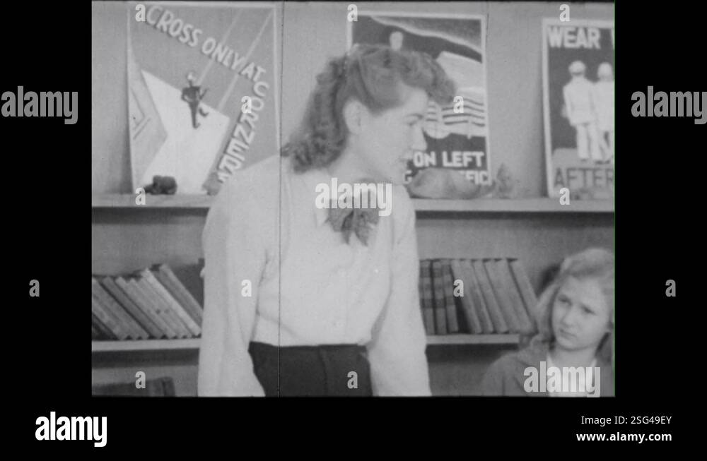 1940s: Teacher places stop sign on map. Students speak. Teacher speaks ...
