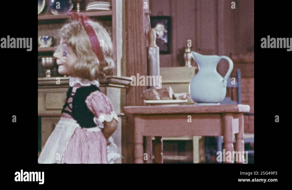 1950s: Stop-motion puppet animation- Little girl cries into hanky, boy ...