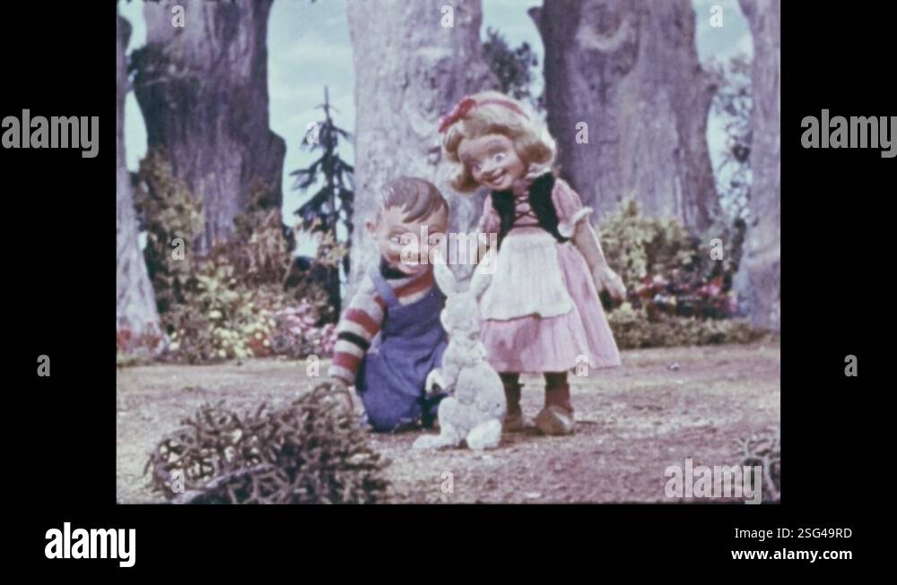 1950s: Stop-motion puppet animation- Boy and girl open a wooden ...