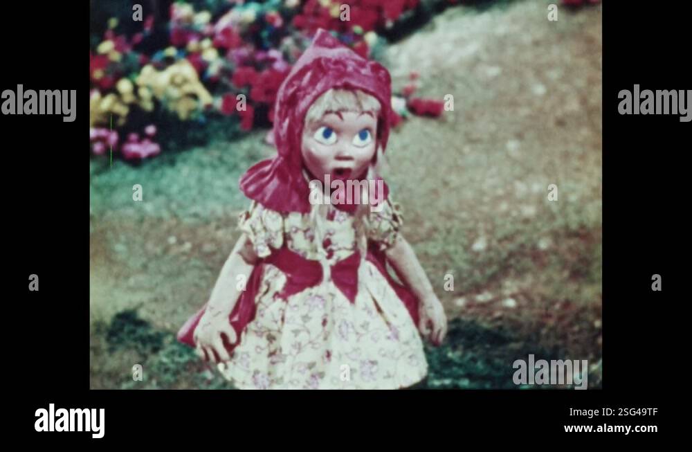 1940s: Stop-motion puppet animation- A little girl in red cape looks at ...