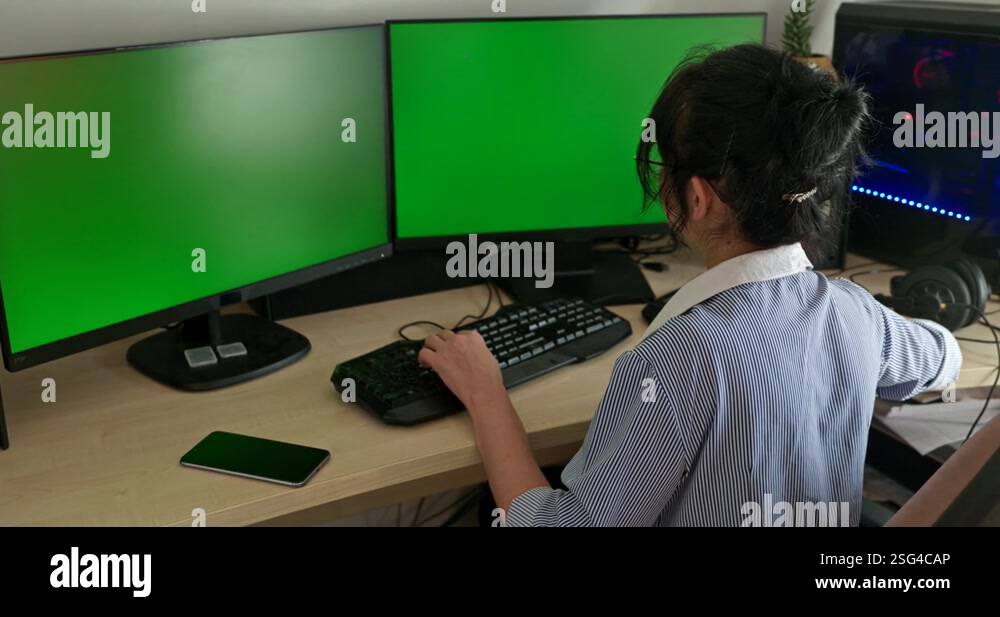 Young Woman Wear Glasses Look Watch at Green Screen Monitor Desktop PC ...