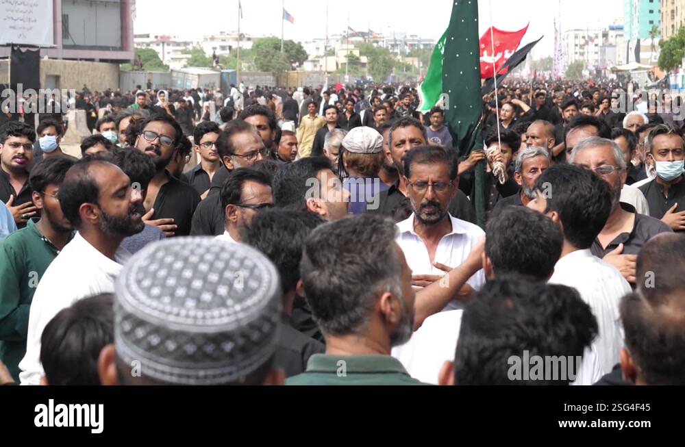 Group Of Men In Crowd Chanting In Unison At Parade Of Muharram In ...